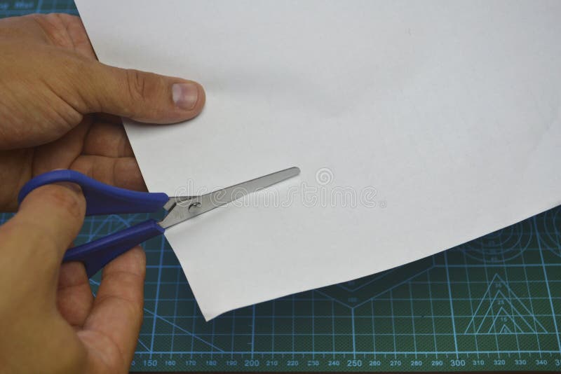 A paper and a scissors stock photo. Image of clip, crop - 157415768