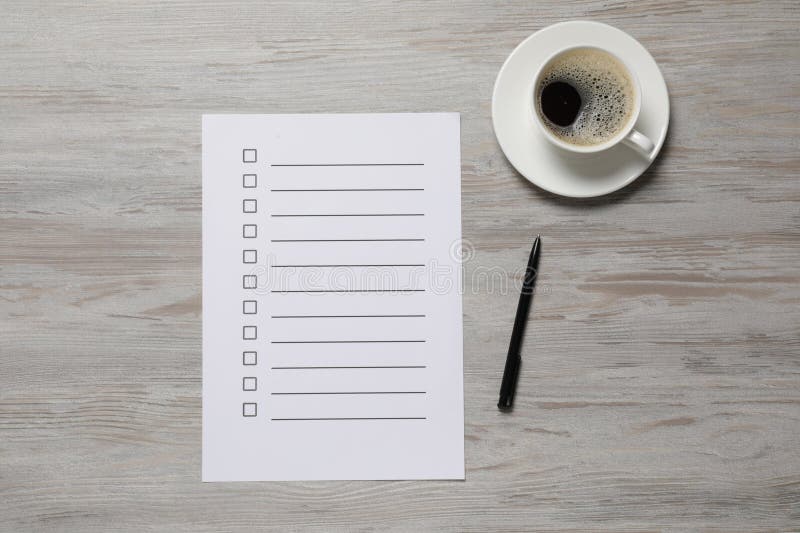 Paper Sheet with Checkboxes, Cup of Coffee and Pen on White Wooden ...