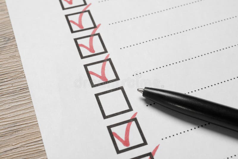 Paper Sheet with Checkboxes and Pen on Wooden Table, Closeup. Checklist ...