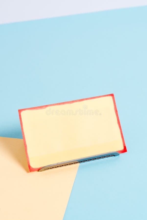 Paper Sheet Placed Tilted on a Buffer Wire with a Soft Pastel Backdrop ...