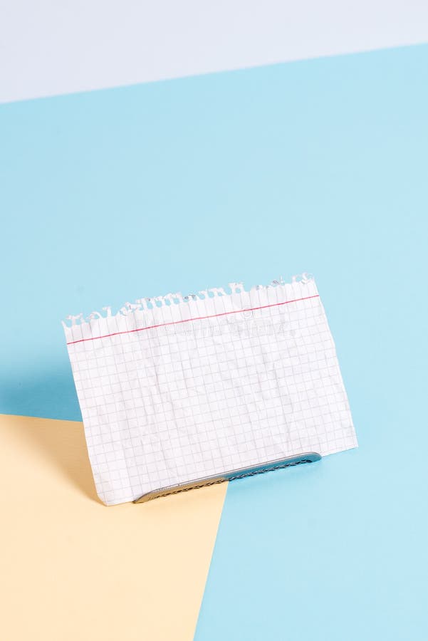 Paper Sheet Placed Tilted on a Buffer Wire with a Soft Pastel Backdrop ...