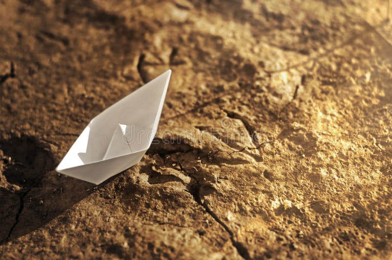 Paper Ship on the Dried Ground Stock Photo - Image of metaphors, ground ...