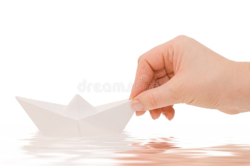 Paper ship in a hand stock photo. Image of nautical, cruising - 13206498