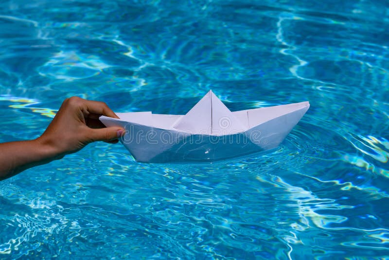 Paper Ship in Hand. Hand and Paper Boat. Origami Paper Boat. Stock ...
