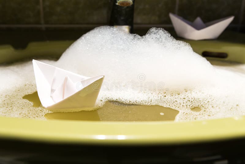 Paper ship in a sink stock image. Image of naval, cruise - 49410267