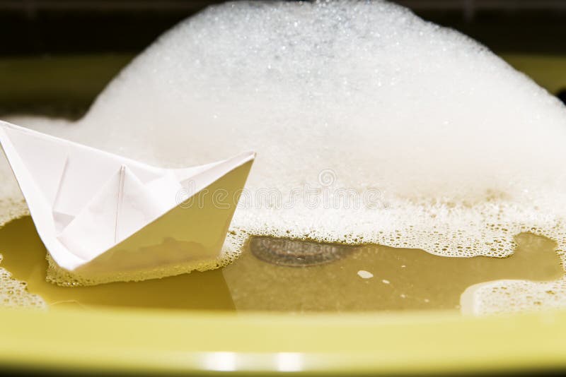 Paper ship in a sink stock image. Image of journey, origami - 55697901