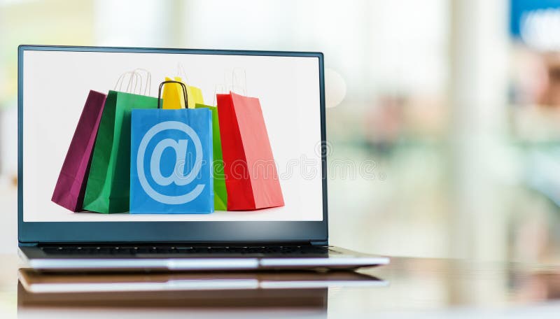Paper Shopping Bags on Laptop Computer Screen. Shopping Online Stock ...