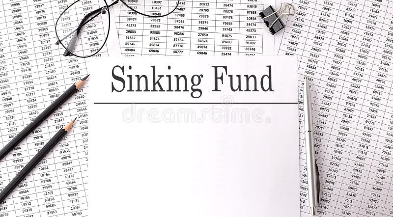 Paper with SINKING FUND on a Table on Charts Stock Photo - Image of ...