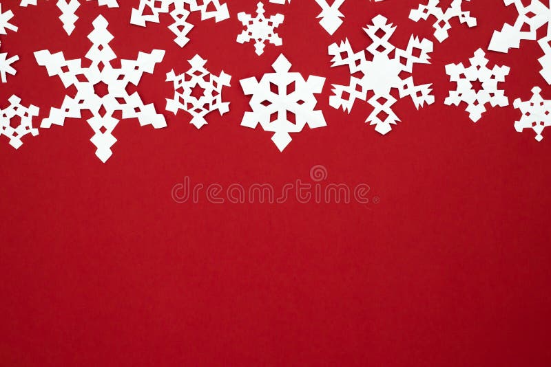 The Paper Snow Flakes on the Red Background. Christmas Red Theme Stock ...