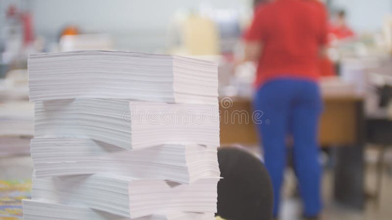 Paper Stack in Front of Worker in the Typography Stock Photo - Image of ...