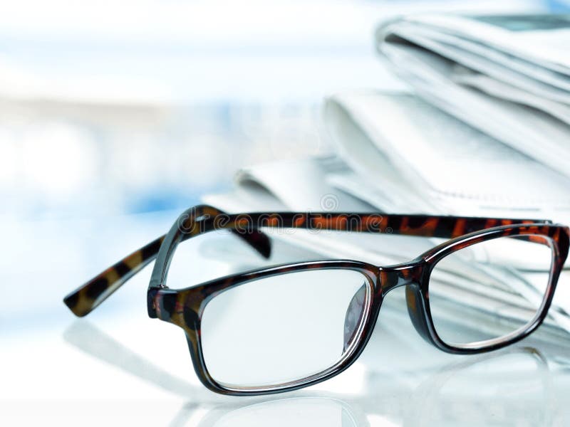Stack of Newspapers and Eyeglasses on Background Stock Image - Image of ...