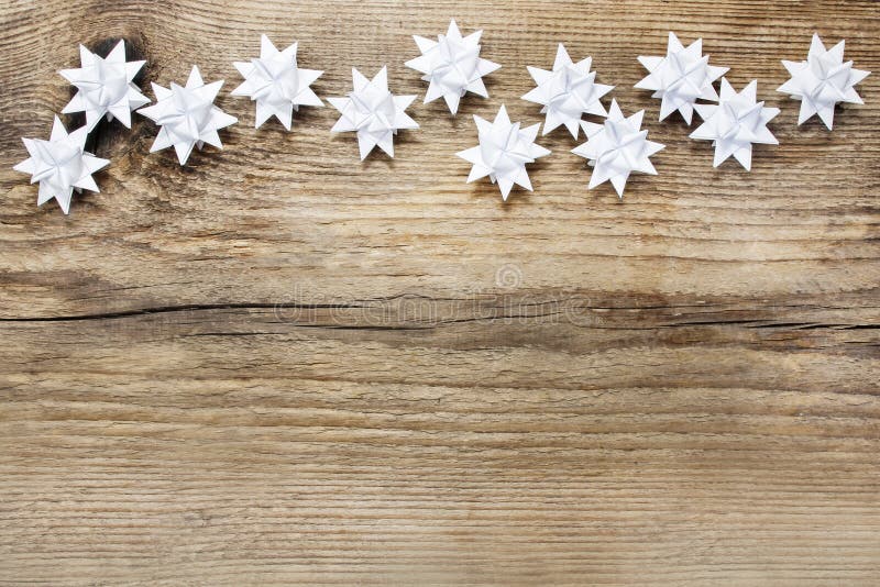 Paper Stars on Wooden Rough Background Stock Photo - Image of beautiful ...