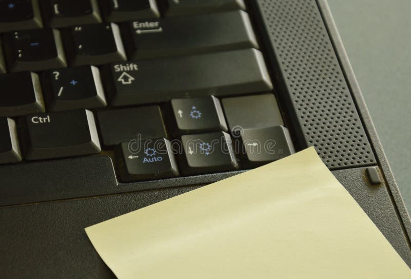 Paper Stick on Computer Notebook for Note Some Messages Stock Photo ...