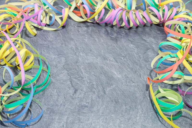 Paper Streamer As Carnival Decoration on a Slate Stock Image - Image of ...