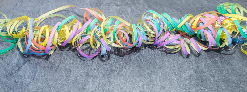 Paper Streamer As Carnival Decoration on a Slate Stock Photo - Image of ...