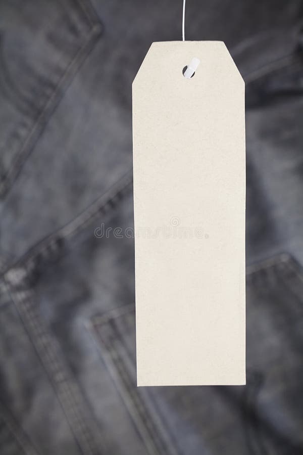 Paper tag on jeans stock image. Image of frame, mall - 92166369