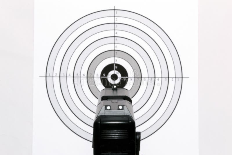 Paper Target and Black Gun on White Stock Photo - Image of individual ...