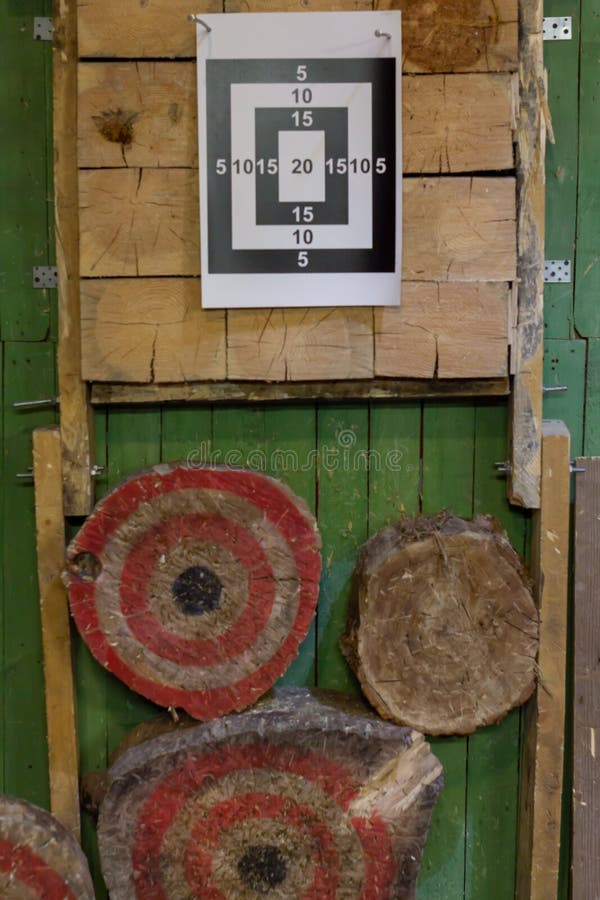 Paper Target on Wooden Wall Stock Photo - Image of shot, bullet: 141527048