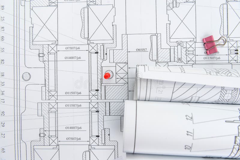 Paper with Technical Drawings and Work Tool on Table. Place of Work ...