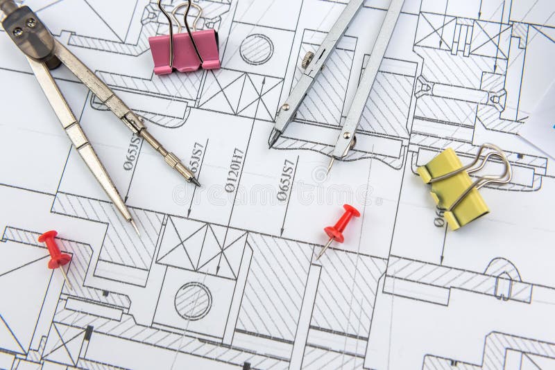 Paper with Technical Drawings and Work Tool on Table. Place of Work ...