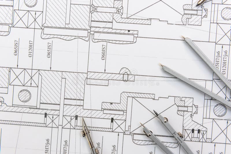 Paper with Technical Drawings and Work Tool on Table. Place of Work ...