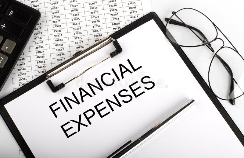 Paper with Text FINANCIAL EXPENSES on the Table on the Chart Stock ...