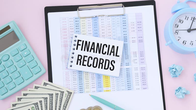 Text FINANCIAL CALCULATIONS on Notepad. Calculator with a Magnifying ...