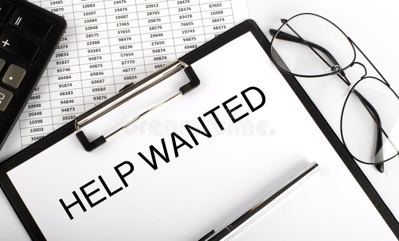 Paper with Text HELP WANTED on the Table on Chart Stock Image - Image ...
