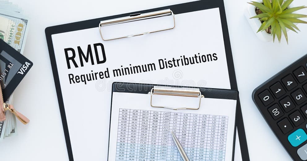 Paper with Text RMD Required Minimum Distributions on a Table Stock ...