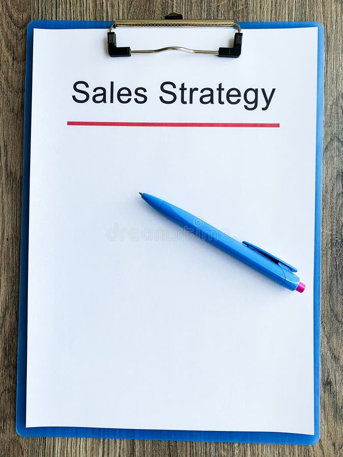 Paper with Text Sales Strategy on Wood Table Stock Photo - Image of ...