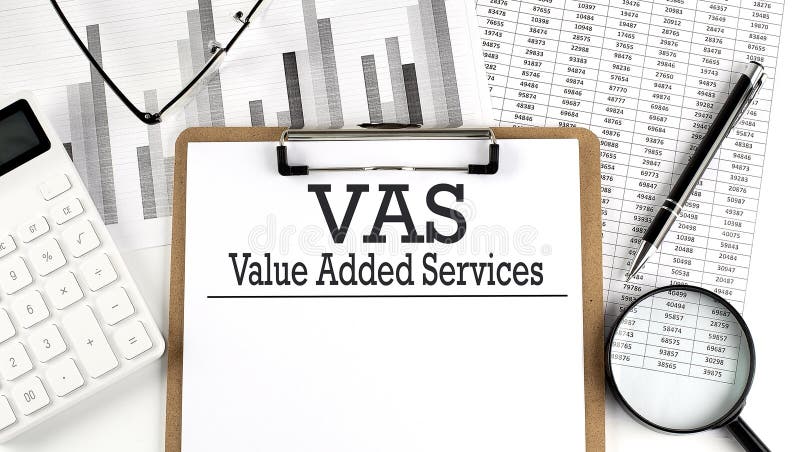 Paper with VAS - Value Added Services on a Chart with Calculator,pen ...