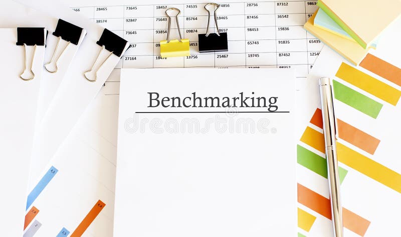 Paper with Words Benchmarking and Charts and Office Tools Stock Photo ...