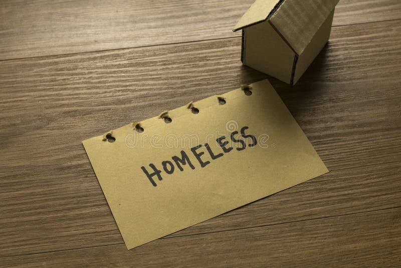 A Paper Written with Homeless and Cardboard House Stock Photo - Image ...