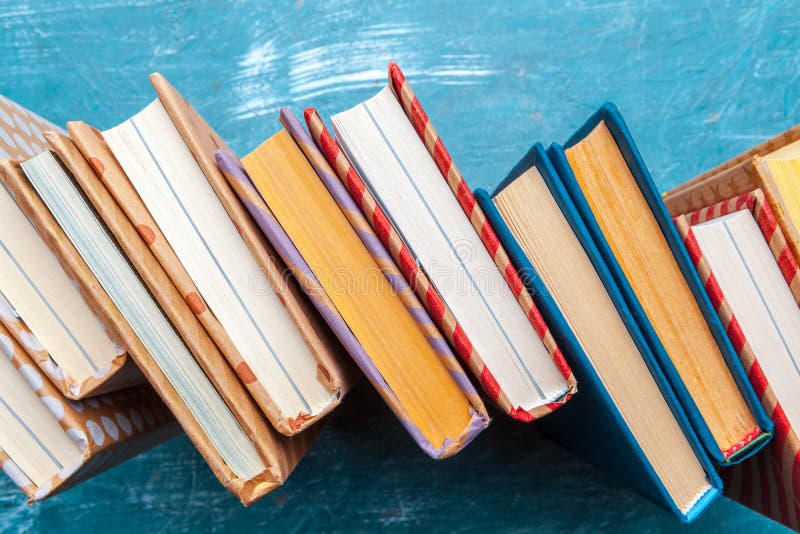 Paperback Books on a Table Creative Photo. Stock Photo - Image of page ...