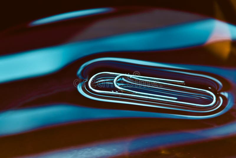 Paperclip floating stock photo. Image of float, clip, metal - 4551244