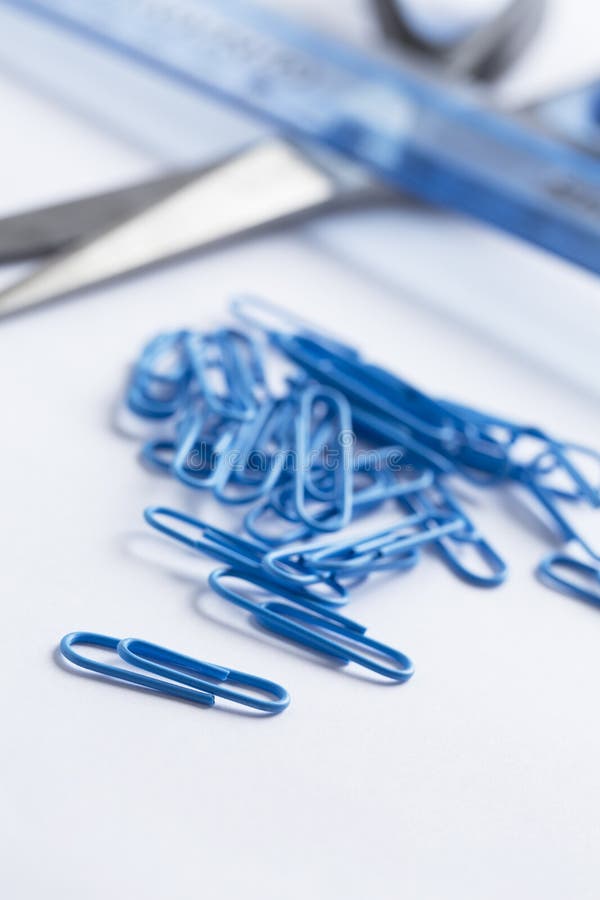 Paperclips Scattered on White Surface Stock Image - Image of office ...