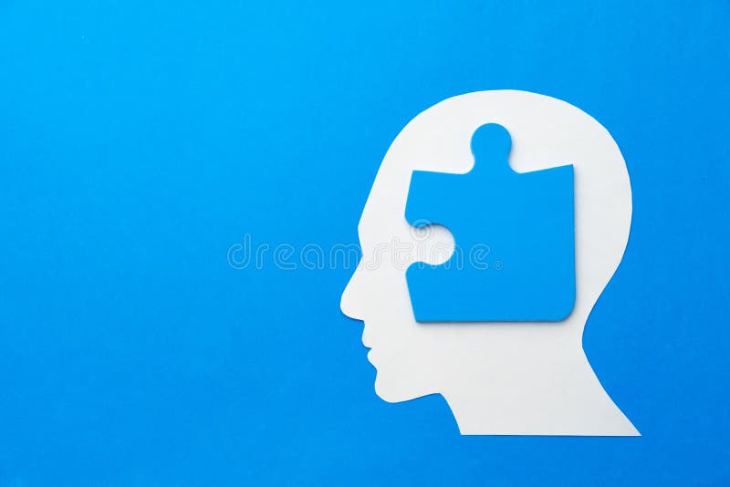 Papercut Head with Jigsaw Puzzle Pieces on Blue Background Stock Image ...