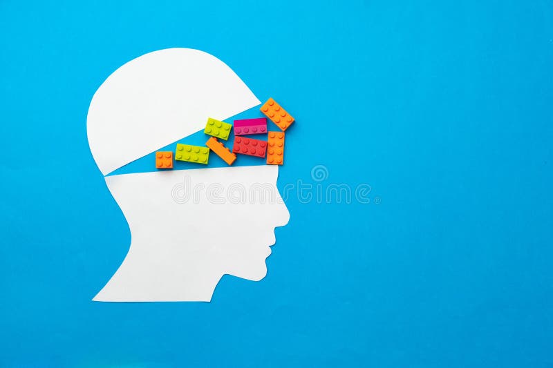 Papercut Silhouette of Human Head with Colorful Constructor Pieces ...