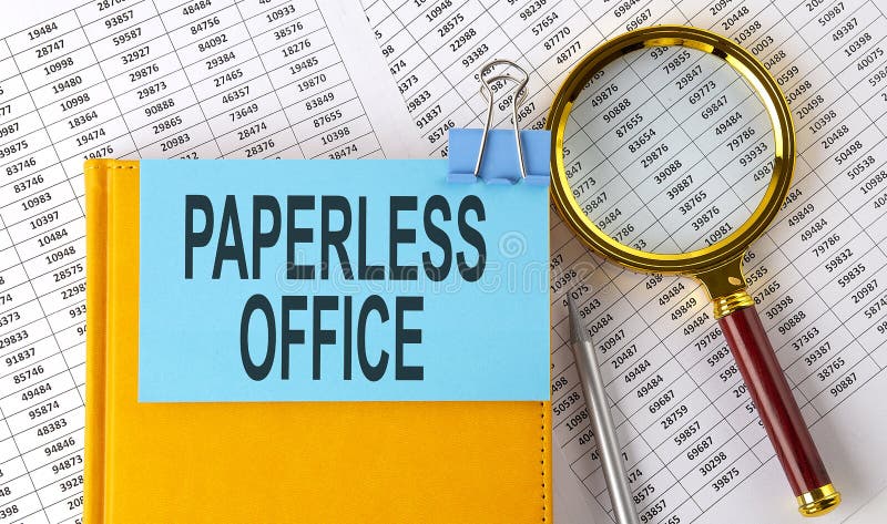 PAPERLESS OFFICE Text on Sticker on Notebook with Magnifier and Chart ...