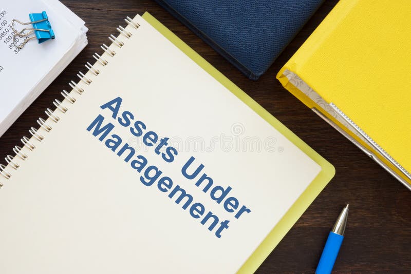 Papers about Assets Under Management and Notebook. Stock Photo - Image ...