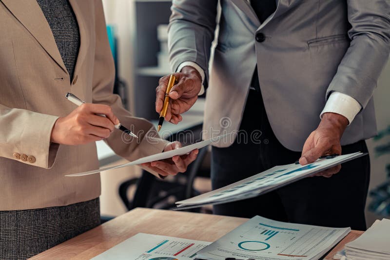 Paperwork and Hands on Table in Business Presentation or Seminar Group ...