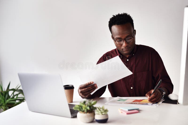Paperwork Still Matters in the 21st Century. a Handsome Young ...