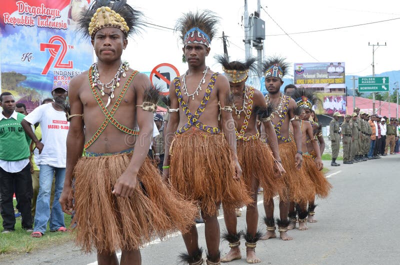 Papuan indigenous people editorial stock image. Image of marching ...