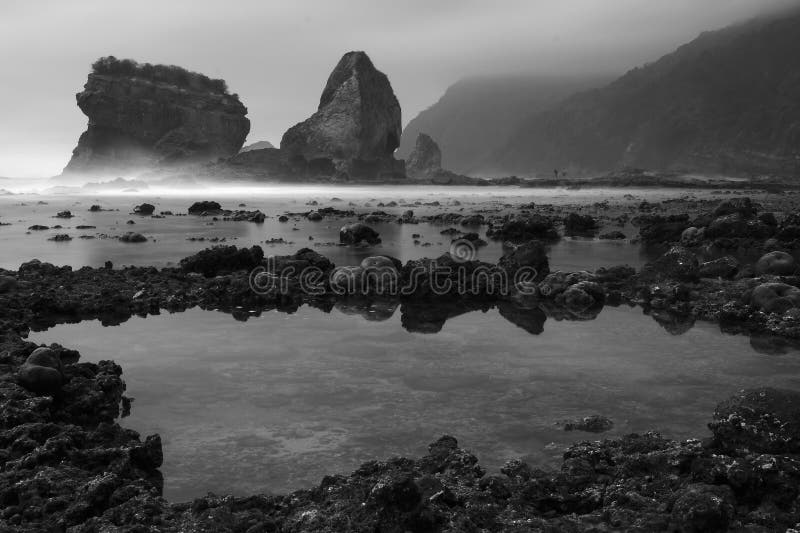 Papuma Beach, Has a Unique Coral Beauty Stock Photo - Image of morning ...