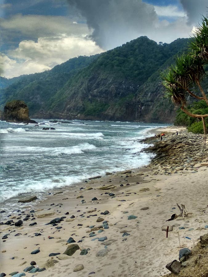 Papuma Beach Scene with a Beatiful Wave Stock Photo - Image of east ...
