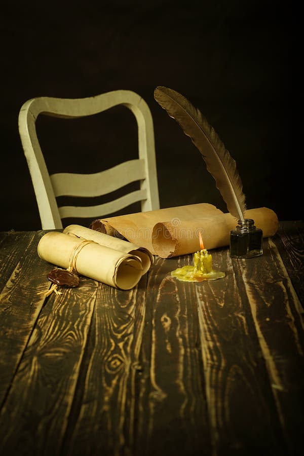 Papyrus Scrolls on a Wooden Table with an Inkwell, Pen and Shine Stock ...
