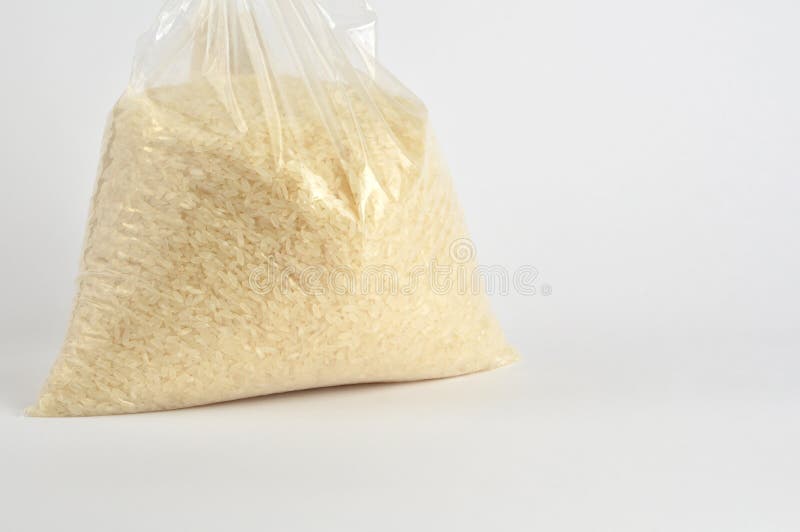 Paquet De Riz Sur Le Fond Blanc Image stock - Image of sain, personne ...