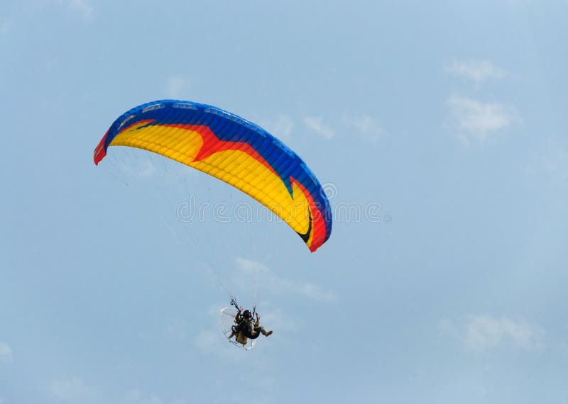 Paraglider on Bright Blue Sky Stock Photo - Image of parachute, cells ...