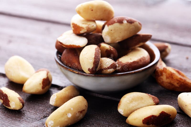Para Nuts on a Rustic Wooden Table and Para Nuts in Bowl Stock Photo ...
