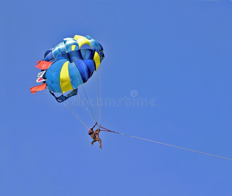 Parachute in blue stock image. Image of holiday, people - 25572571